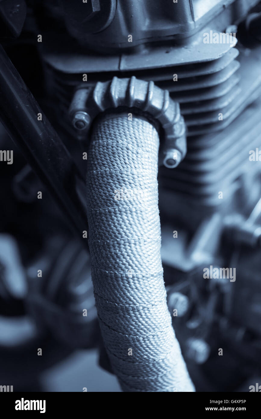 Detail of a motorcycle exhaust pipes and cylinders Stock Photo - Alamy