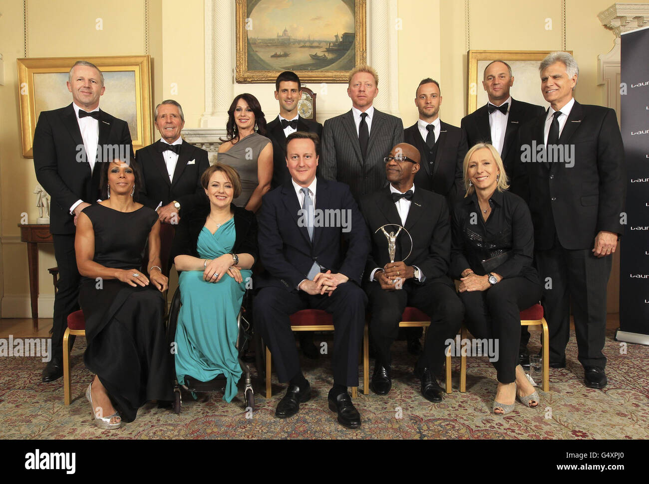 Britain's Prime Minister David Cameron (front row centre) poses for a ...