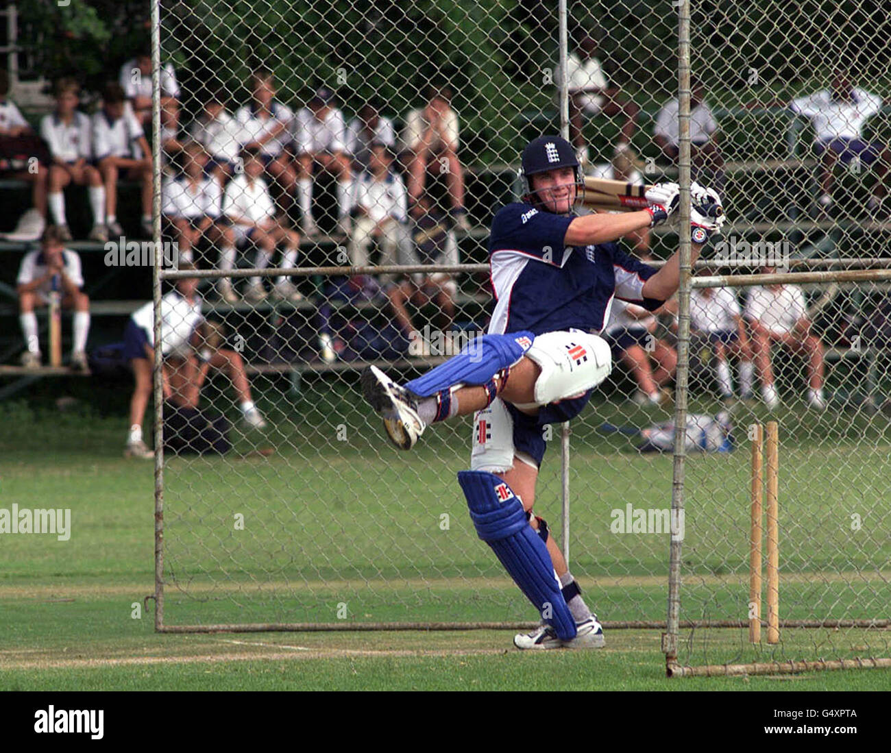 England cricketer Chris Read, watched by local schoolchildren hits the ...