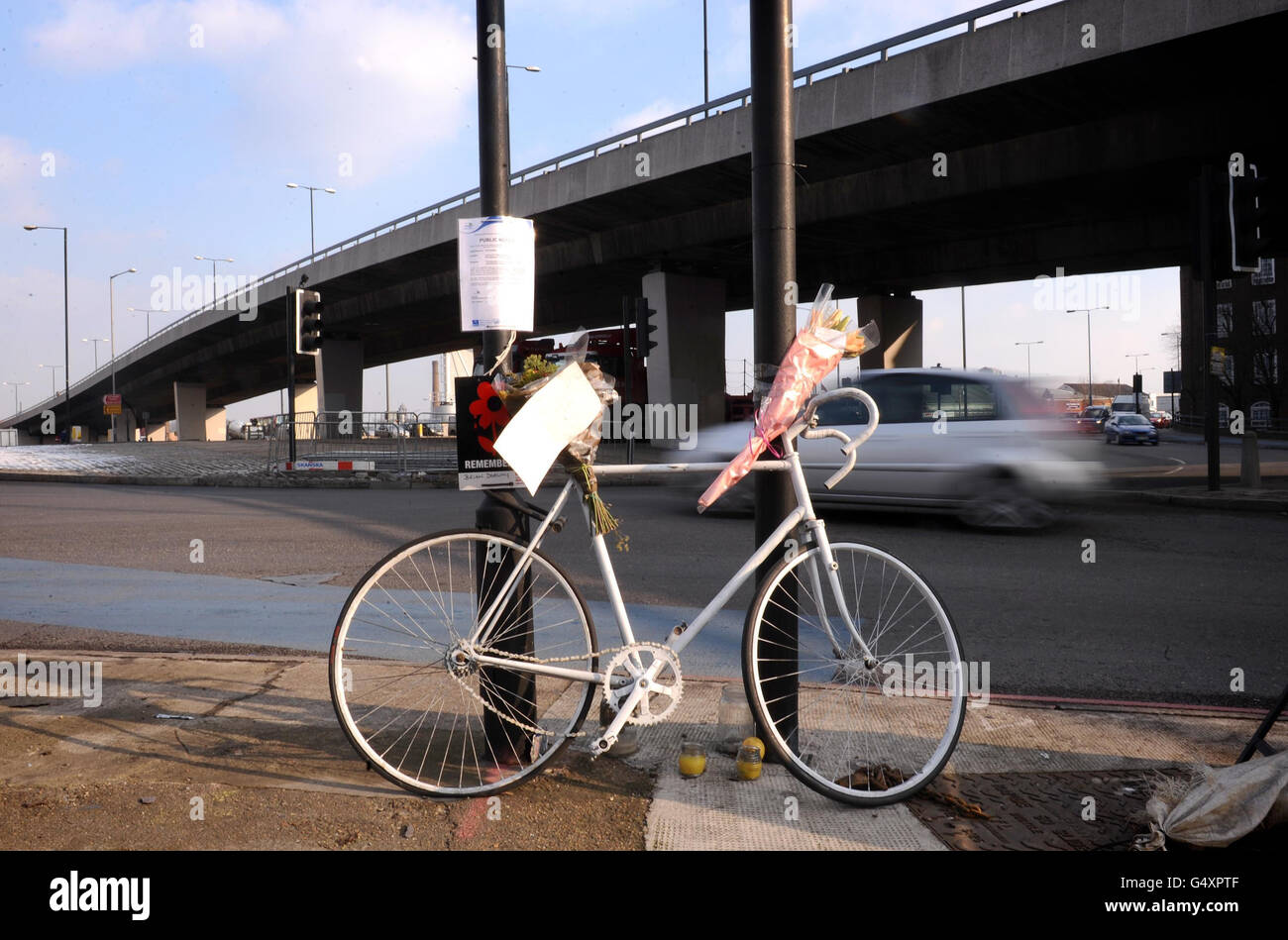 A ' Ghost Bike' memorial to a dead cyclist alongside the roundabout at ...