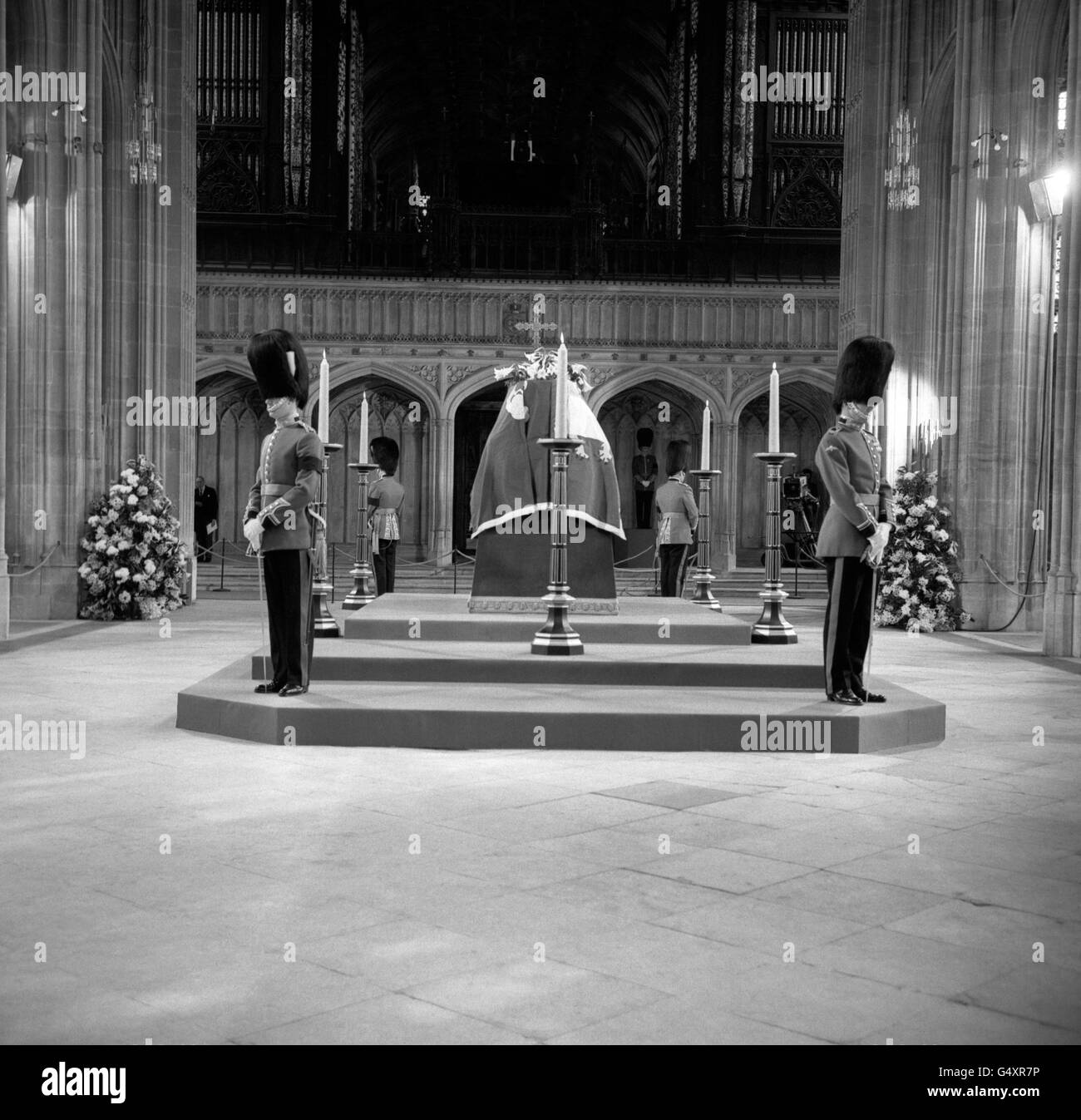Officers of the Grenadier Guards, heads bowed and hands over their ...