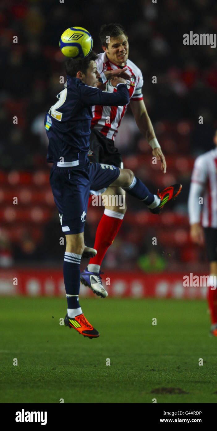 Southampton's Dean Hammond in action against Millwall's Ryan Mason ...