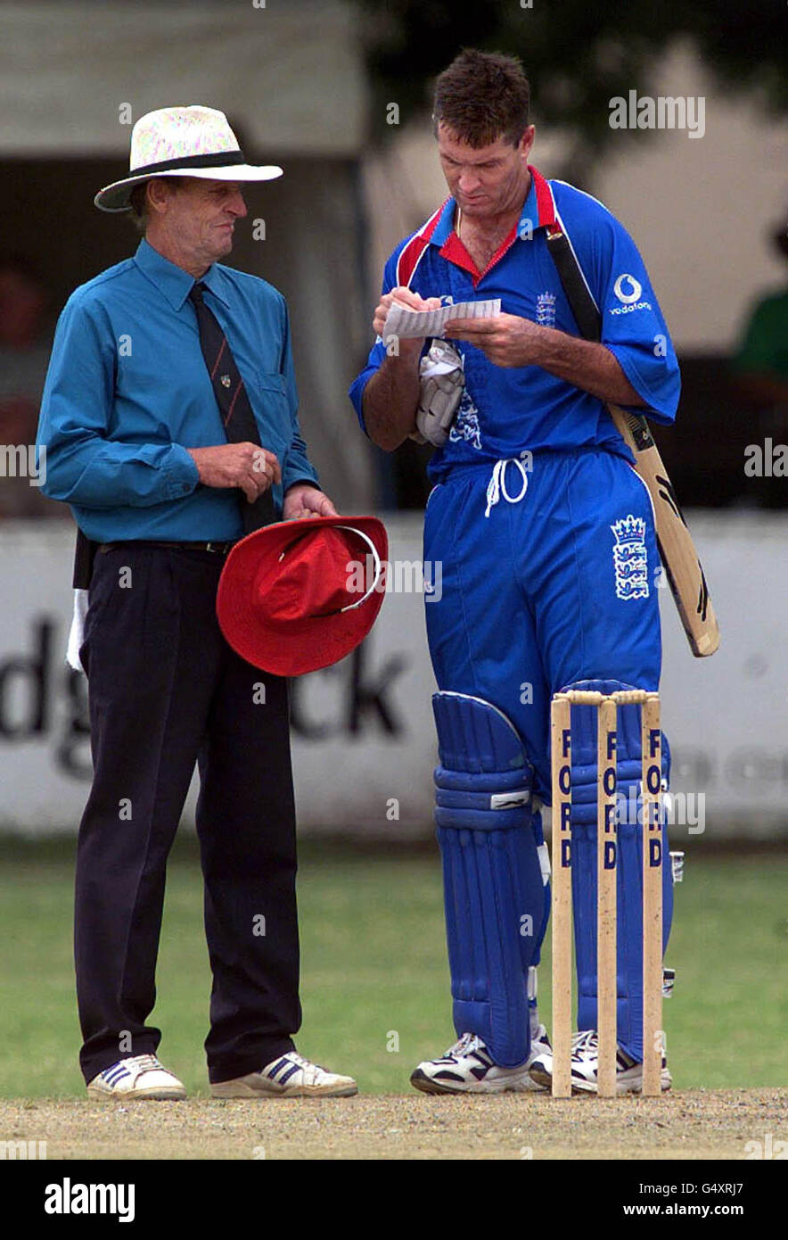 Sport cricket holding bat writing hi-res stock photography and images ...