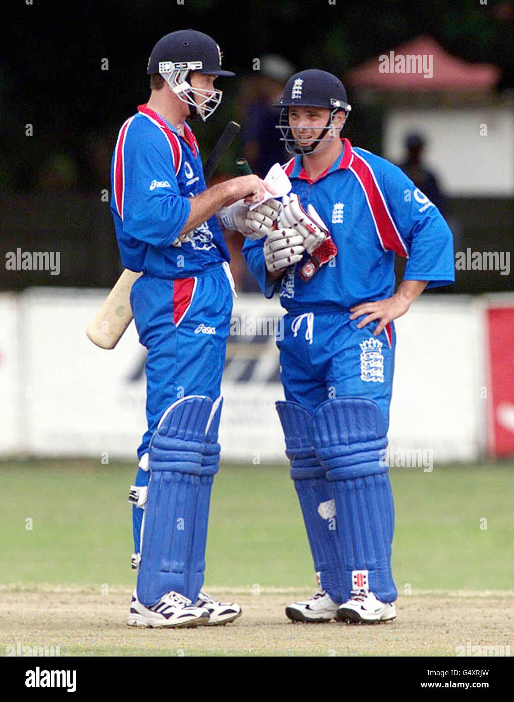 Cricket standing talking padded helmet hi-res stock photography and ...