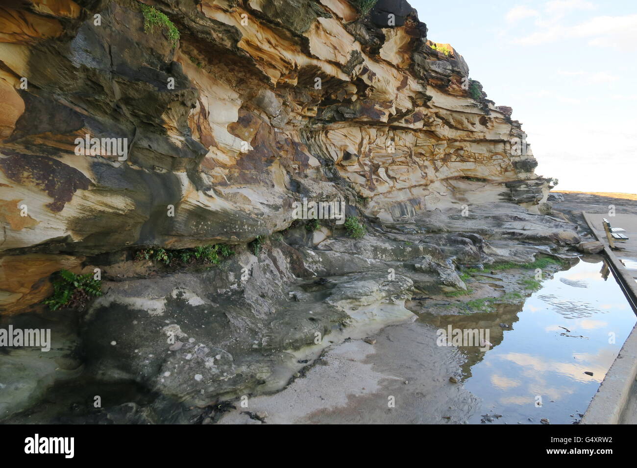 Rock Wall by the Sea Stock Photo - Alamy