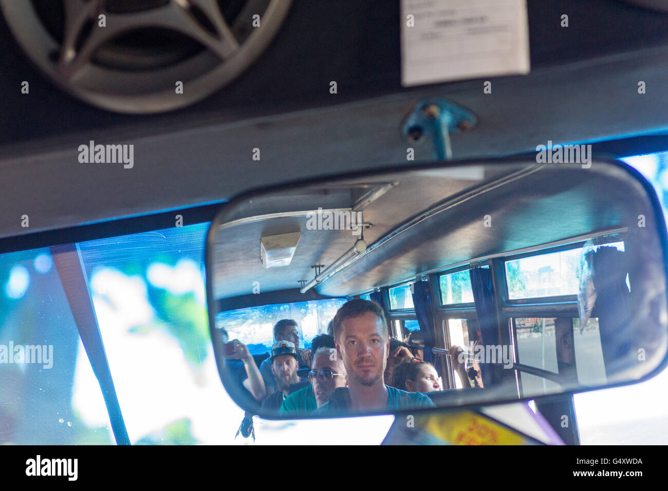 Indonesia, Bali, Jembrana, mirror image in minibus in Indonesia Stock ...