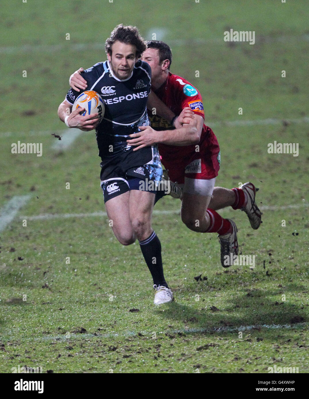 Glasgow Warrior's Ruaridh Jackson and Scarlet's Adam Warren (right ...