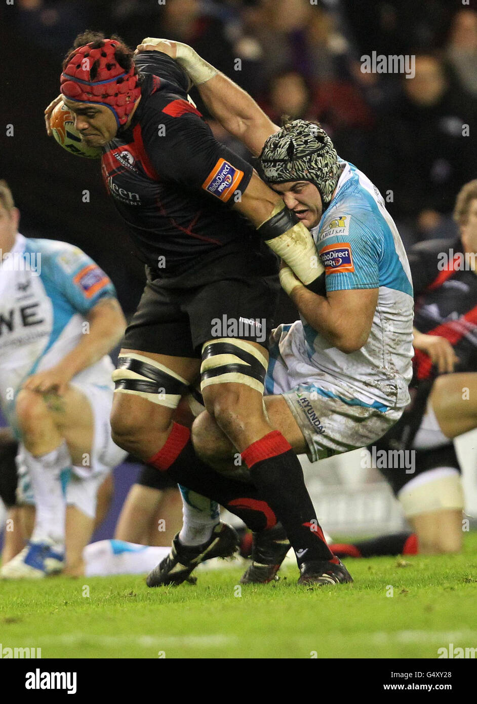 Edinburgh's Netani Talei and Osprey's Joe Rees during the RaboDirect ...