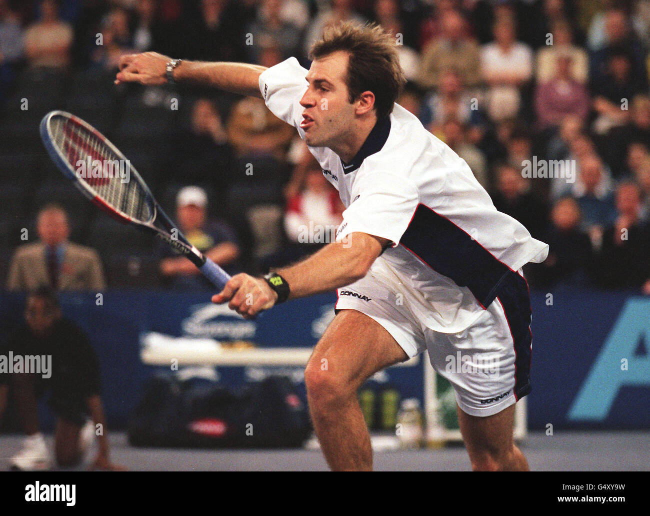 Sport tennis stretching action holding racket greg rusedski hi-res ...