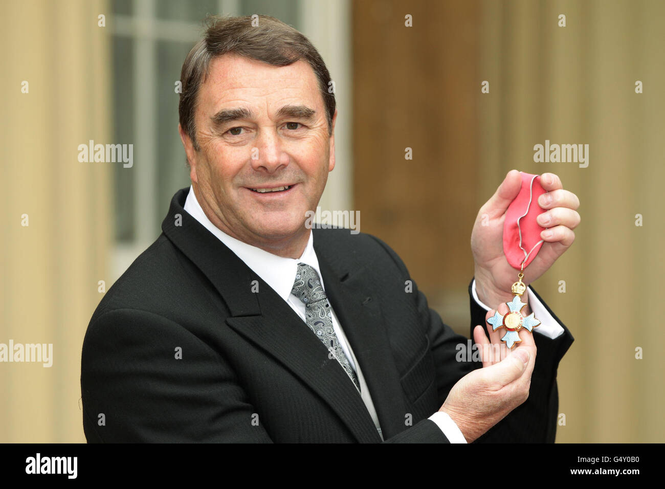 Former Formula 1 world champion Nigel Mansell poses with his Commander ...