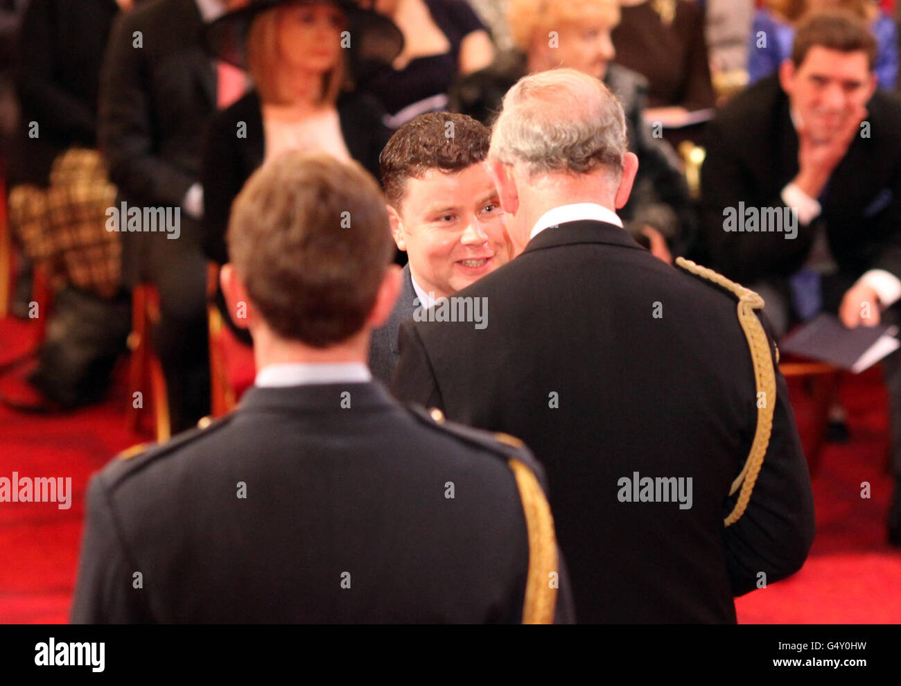 Flight Lieutenant Michael Anderson, Royal Air Force, is decorated with ...