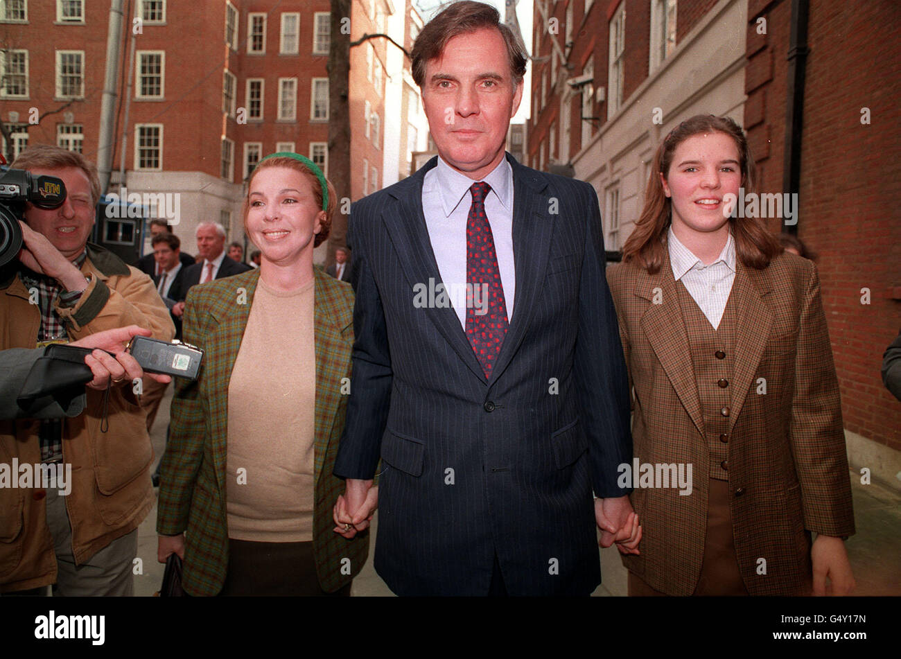 Chief secretary to the Treasury Jonathan Aitken leaves a news ...