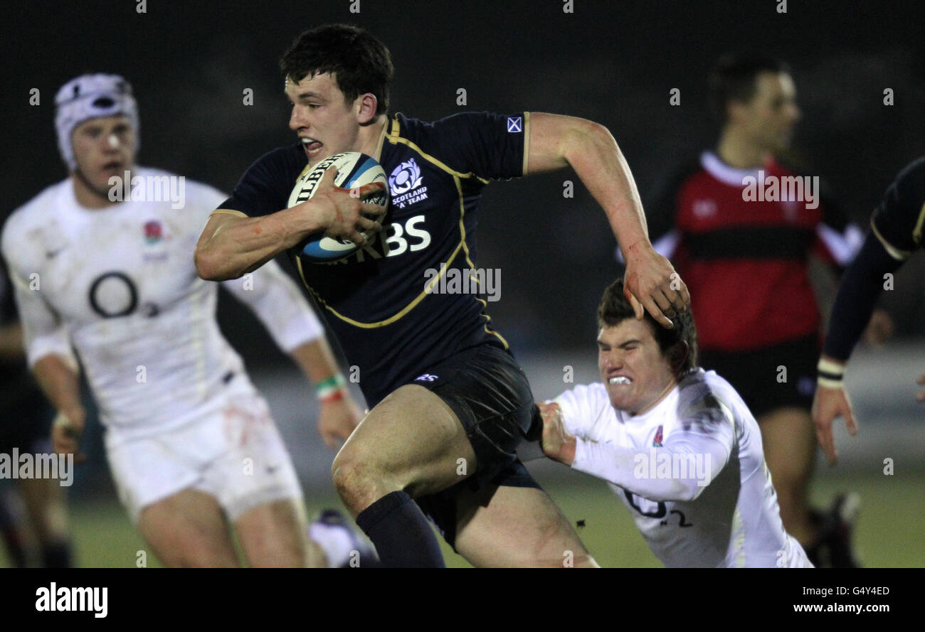 Scotland A's Matt Scott gets away from England Saxons' Ben Spencer ...