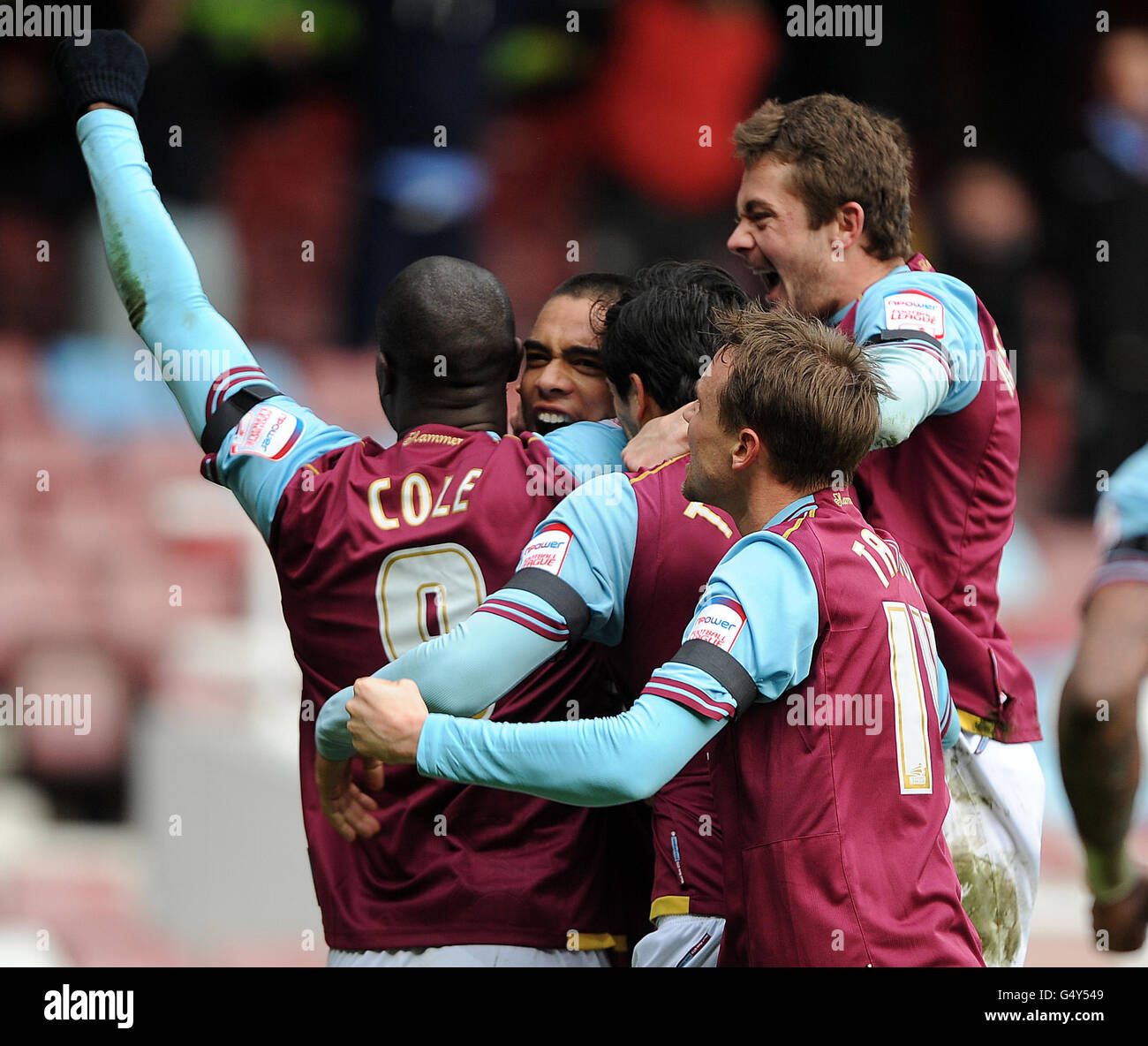 West Ham United's Winston Reid (2nd from left) celebrates with team ...