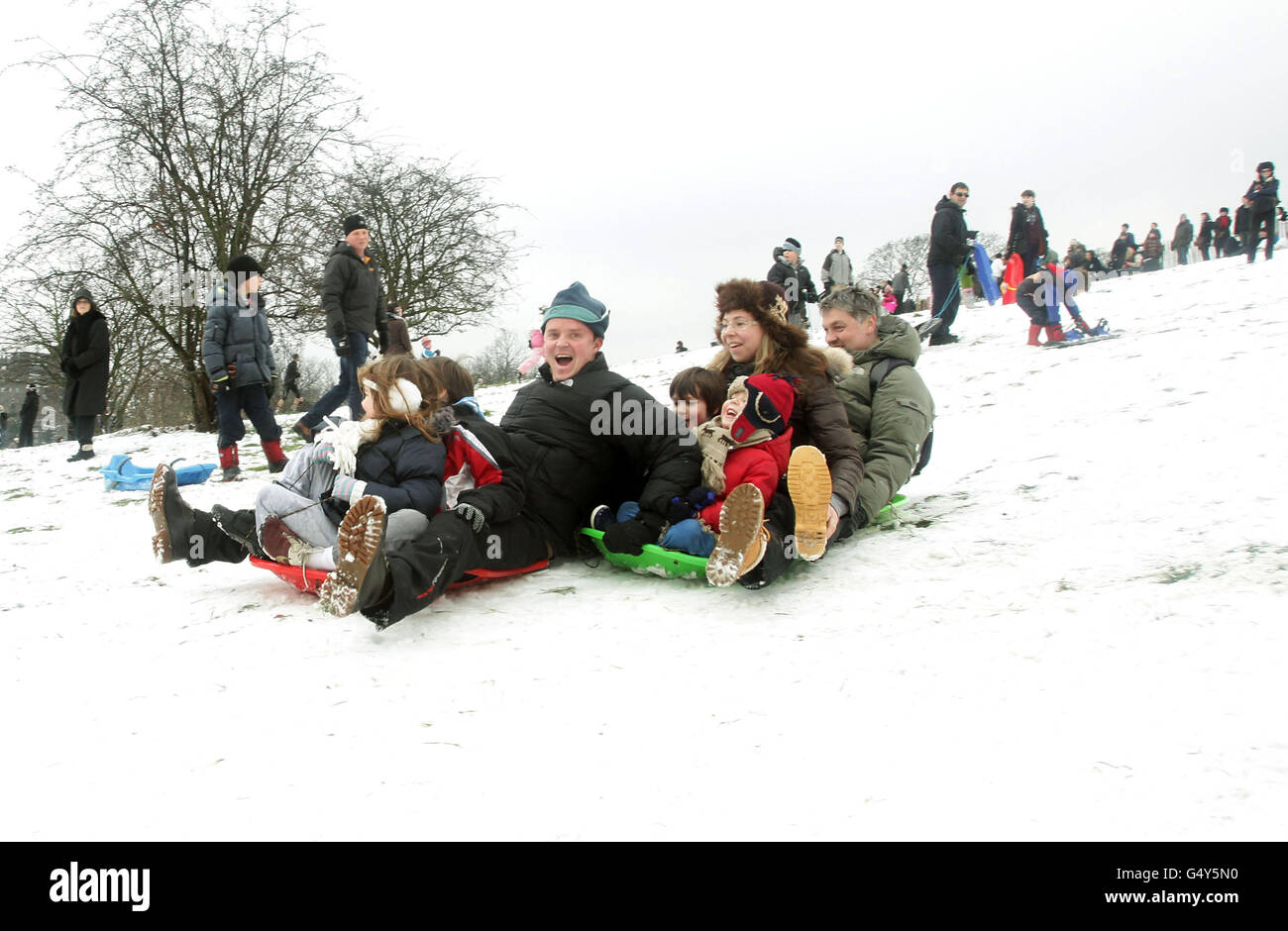People sledge down Primrose Hill in London, as much of Britain woke up ...