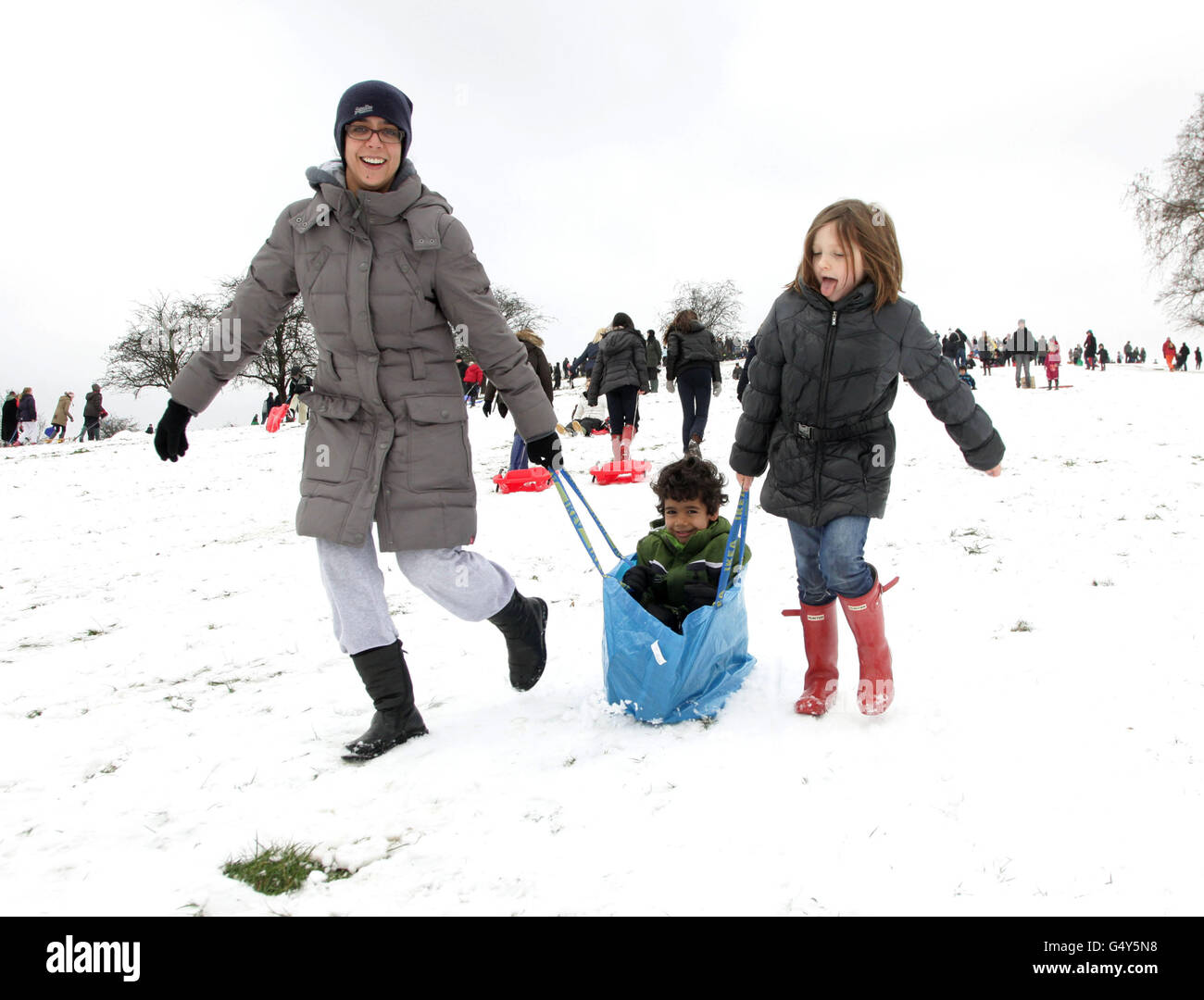 People sledge down Primrose Hill in London, as much of Britain woke up ...
