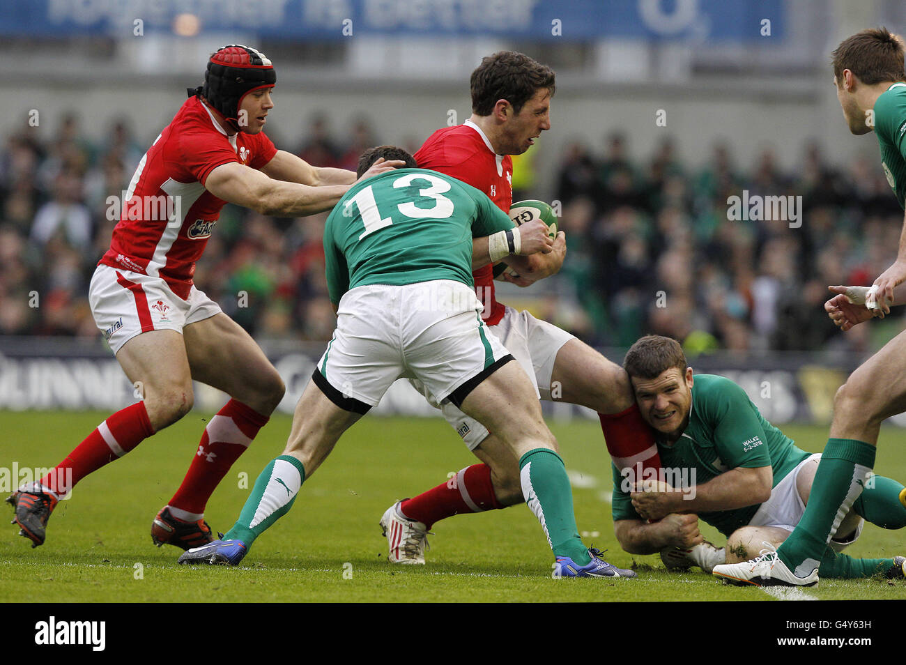 Ireland's Gordan Darcy and Fergus McFadden tackle Wales Alex Cuthbert ...