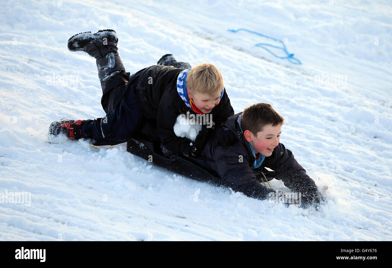 Daniel and James Egerton play on their sledge in Bingham ...