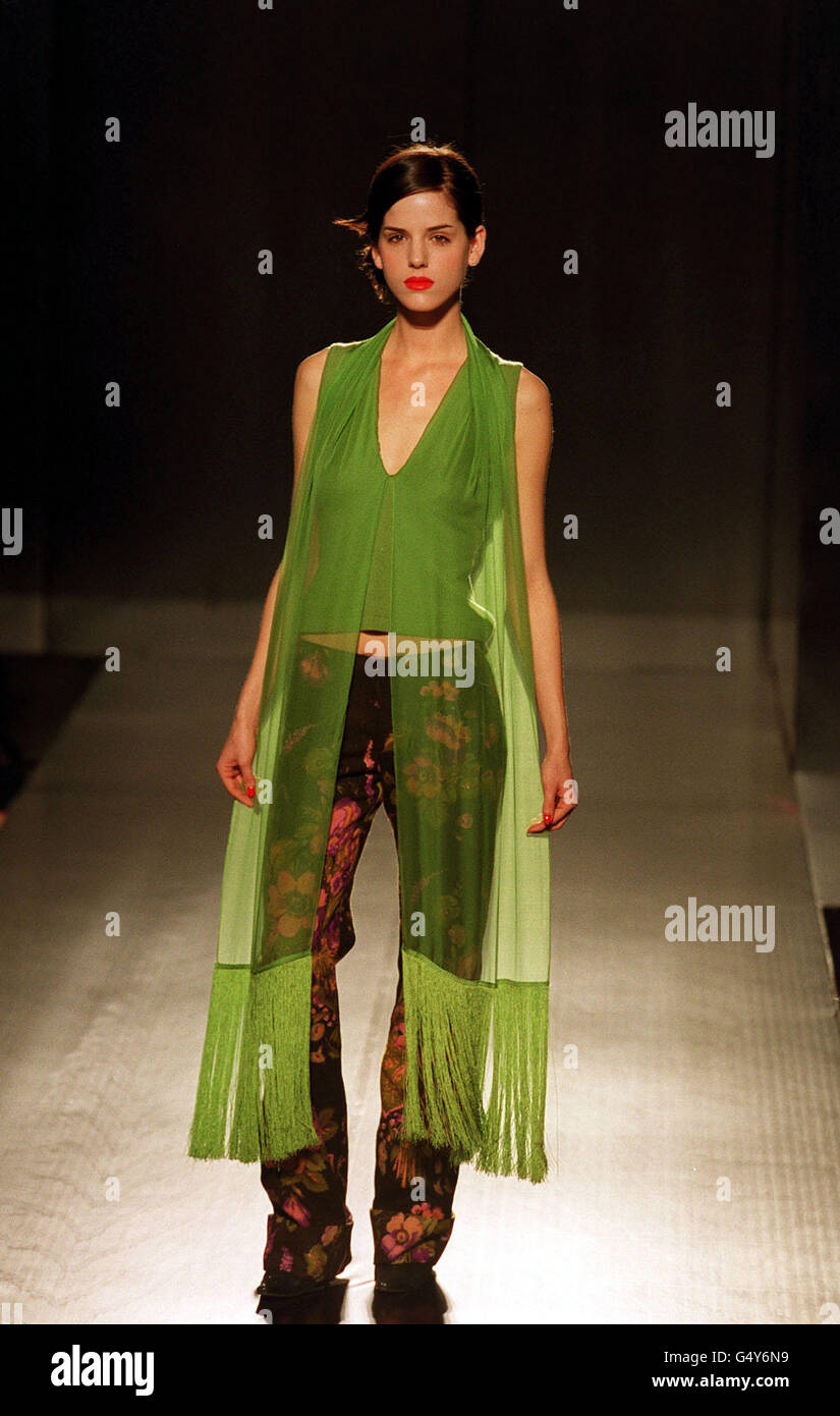 A model displays the latest creation from designer Elspeth Gibson's ...