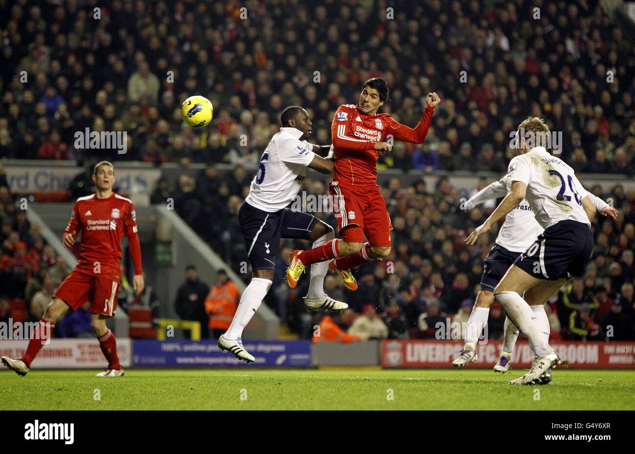Liverpool's Luis Suarez heads at goal ahead of Tottenham Hotspur's ...