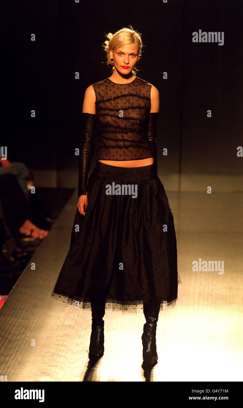 A model displays the latest creation from designer Elspeth Gibson's ...