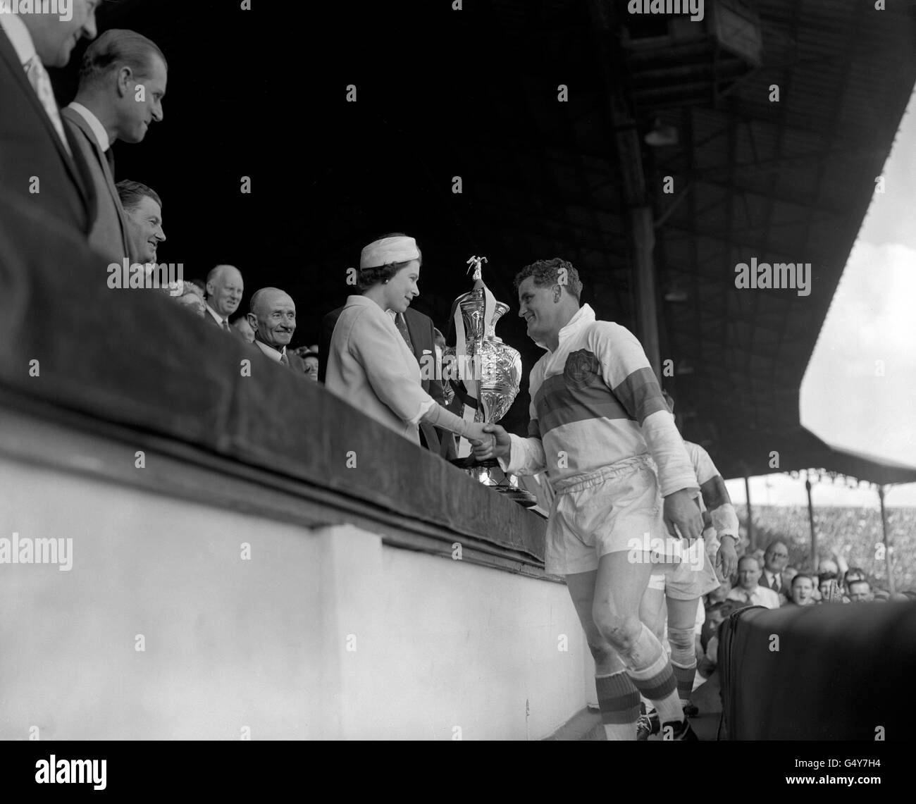Queen Elizabeth II presents the Rugby League Challenge Cup to Derek ...