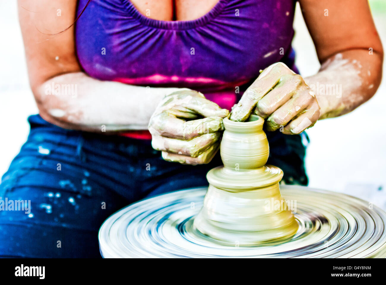 hands working in clay to create crafts and artistic clay pots Stock ...