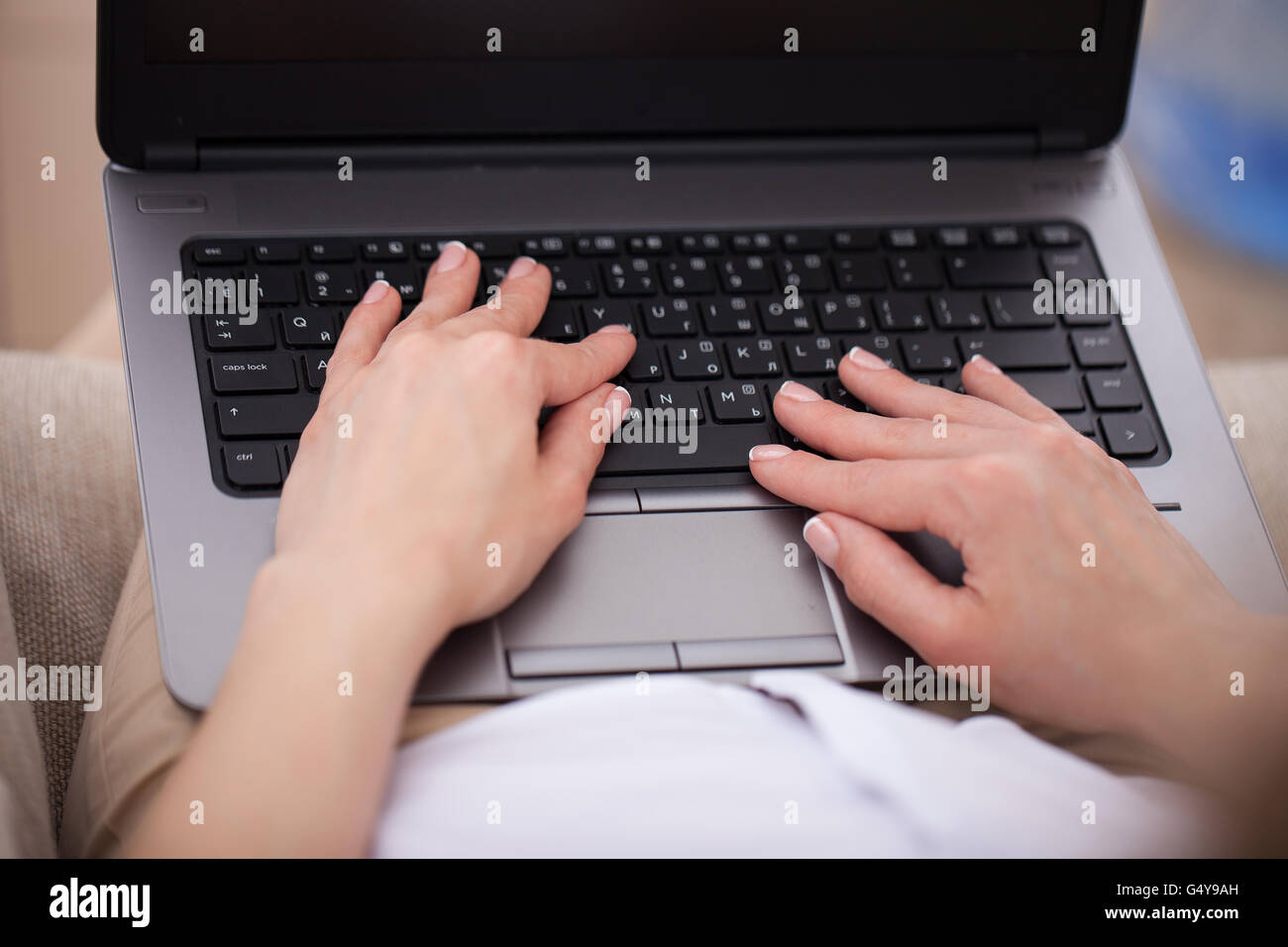 Woman typing on keyboard Stock Photo - Alamy