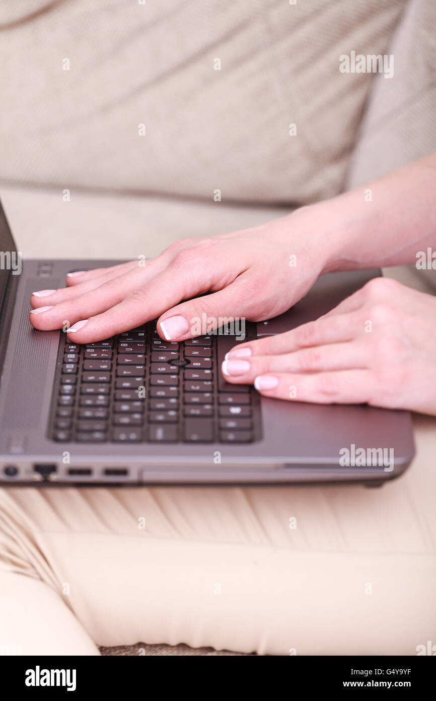 Woman typing on keyboard Stock Photo - Alamy