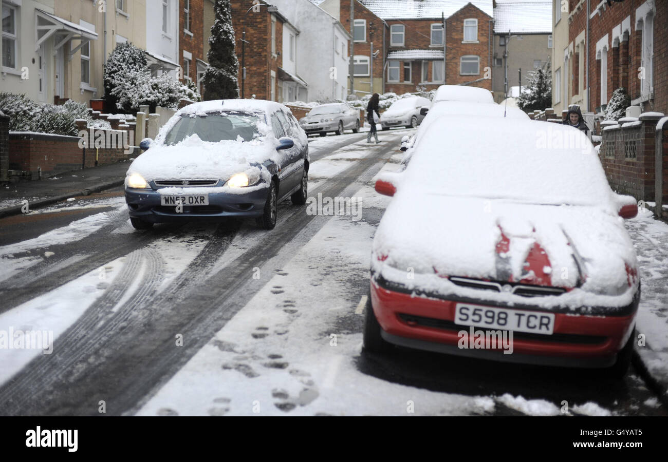 Snow covers cars in Swindon, Wiltshire, following overnight snow Stock ...