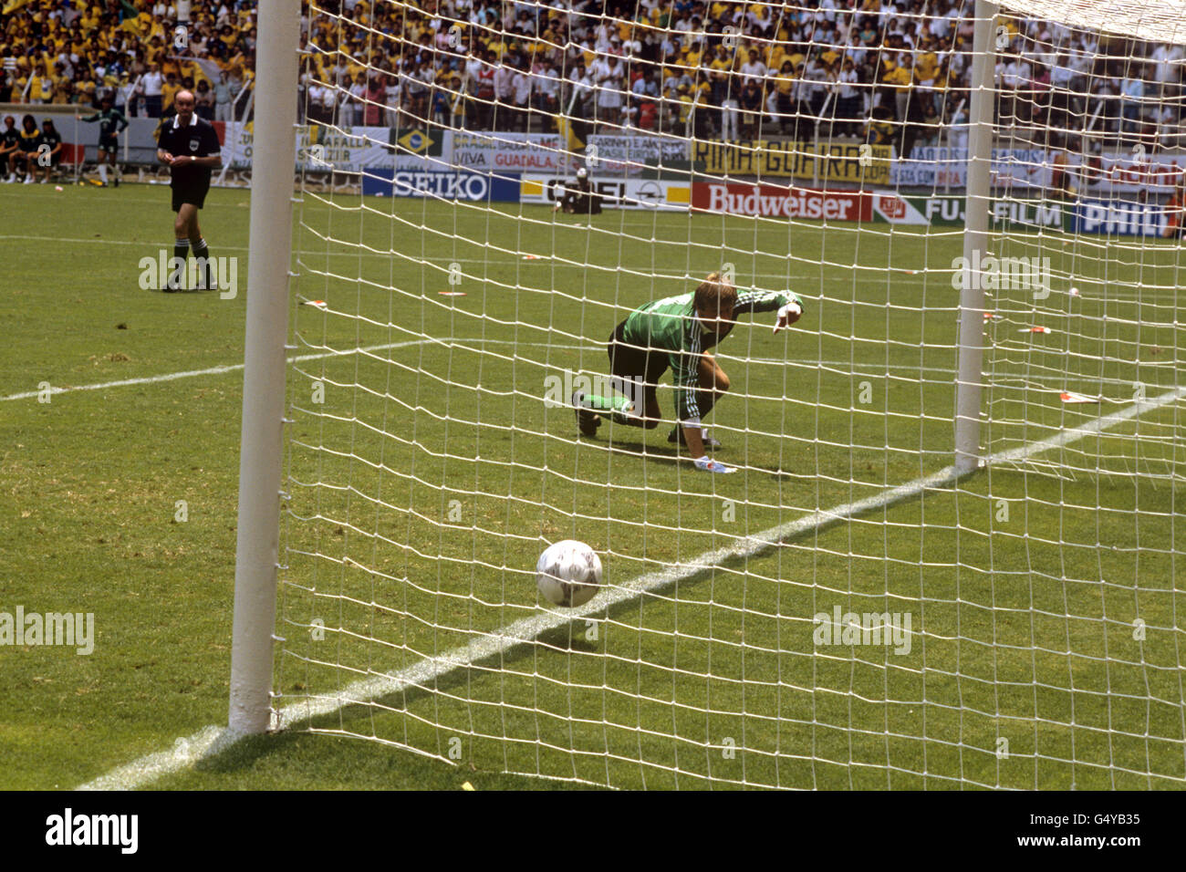 Poland goalkeeper Jozef Mlynarczyk can only watch as Careca (not ...