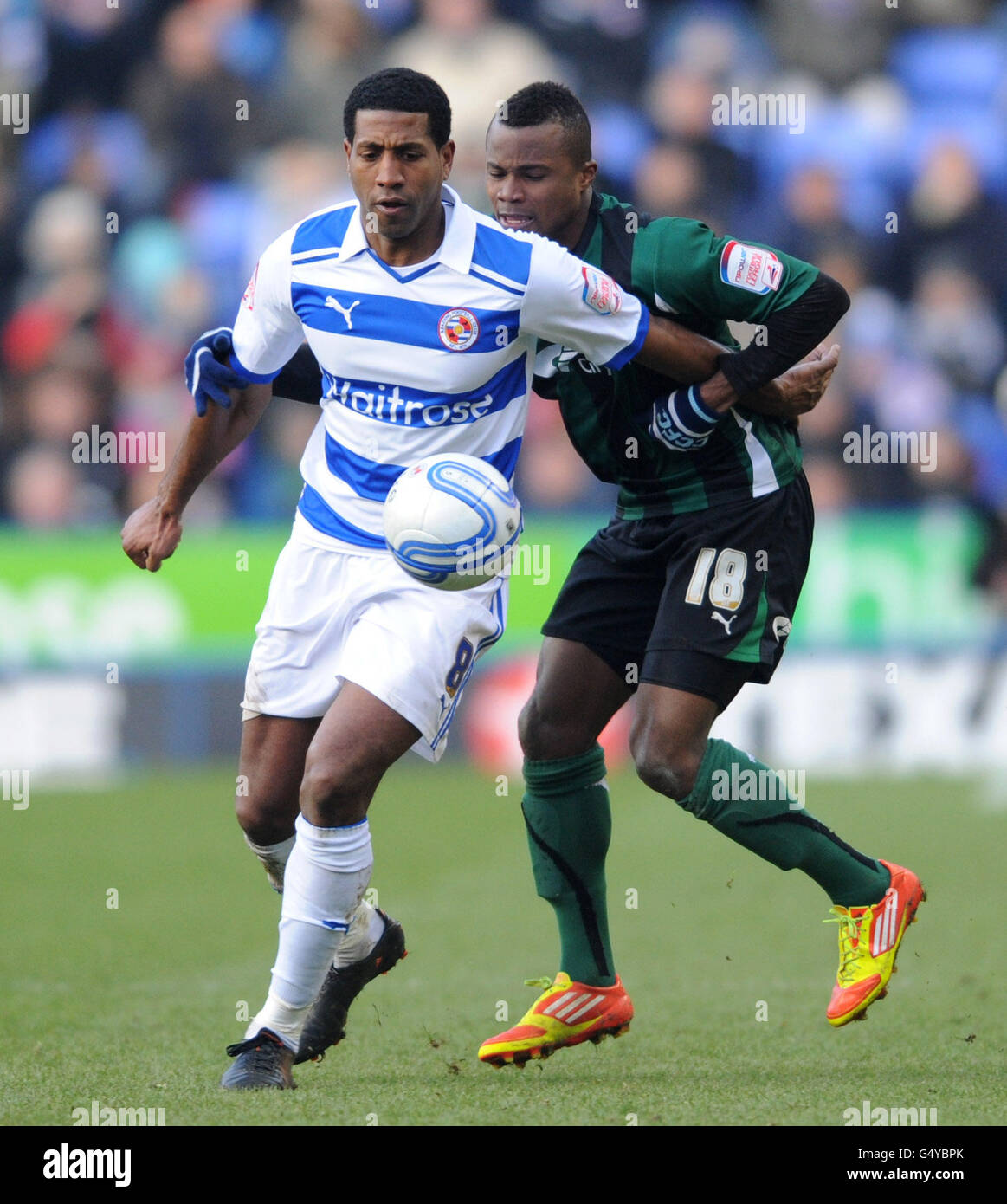 Readings alex coventry citys alex nimely battle for the ball hi-res ...