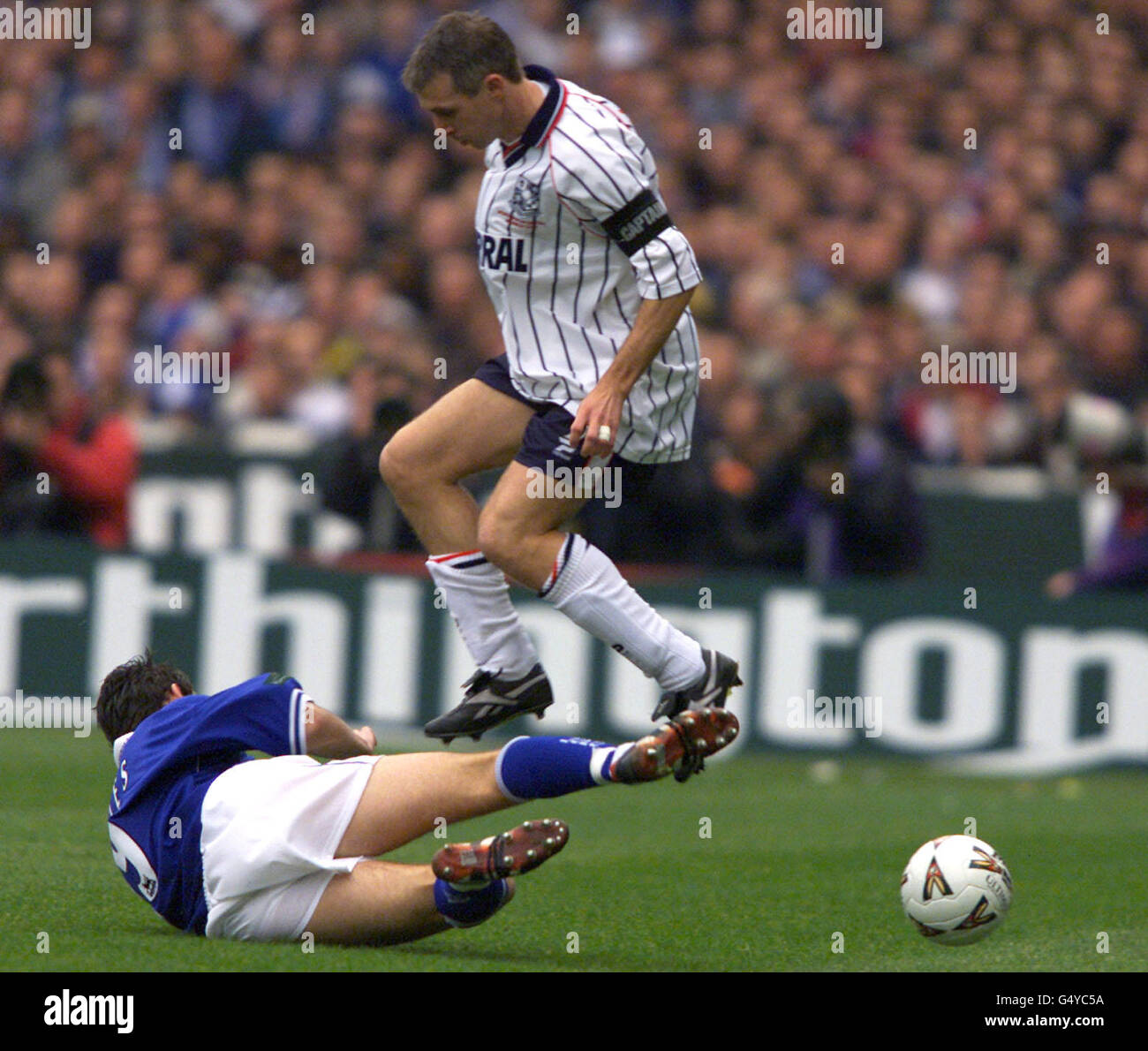 Tranmere Rovers' David Kelly leaps as Leicester City's Stefan Oakes ...