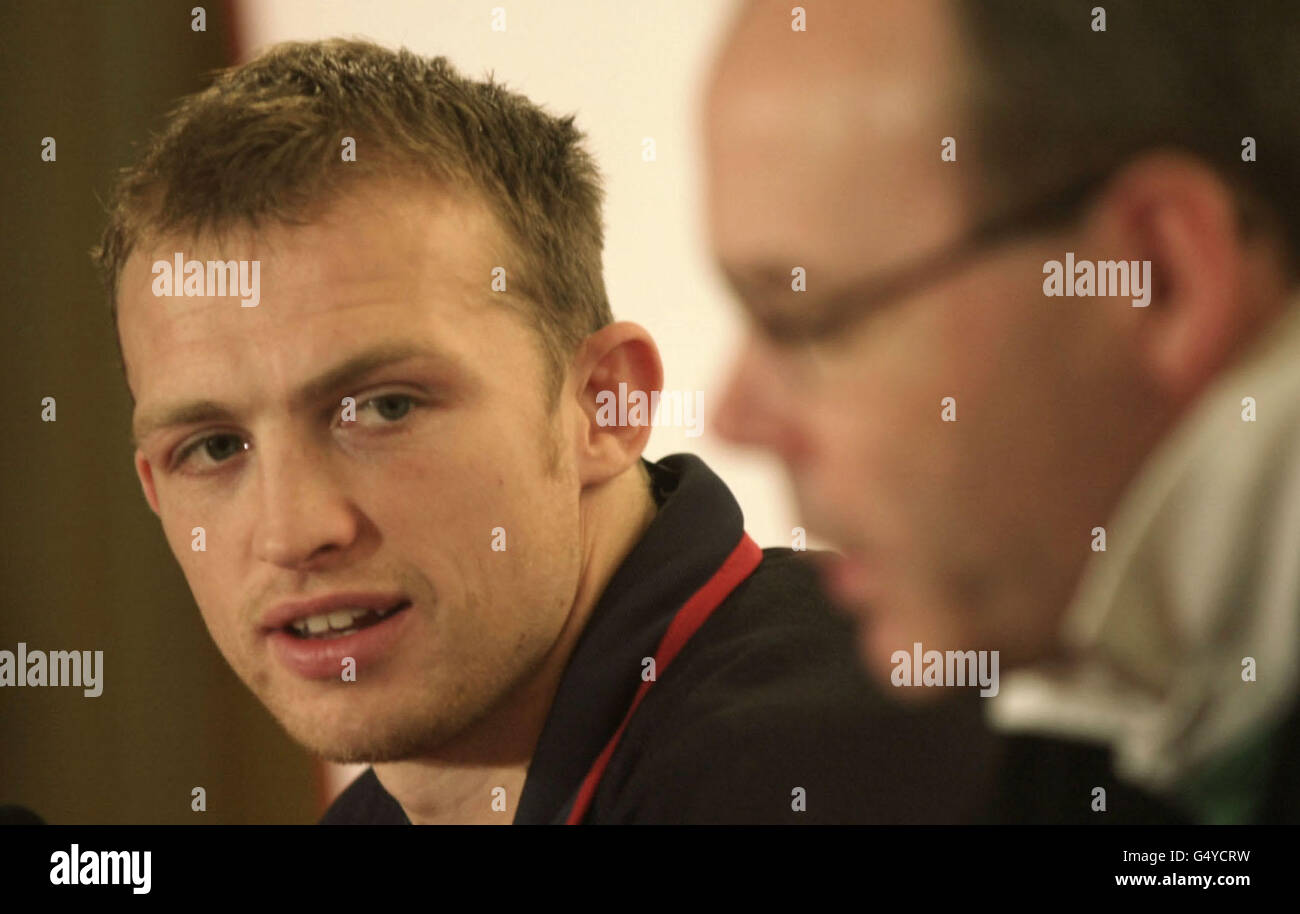 England's rugby captain Matt Dawson (left) listens to coach Clive ...