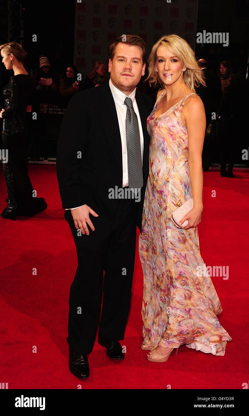 James Corden and wife Julia arriving for the 2012 Orange British ...