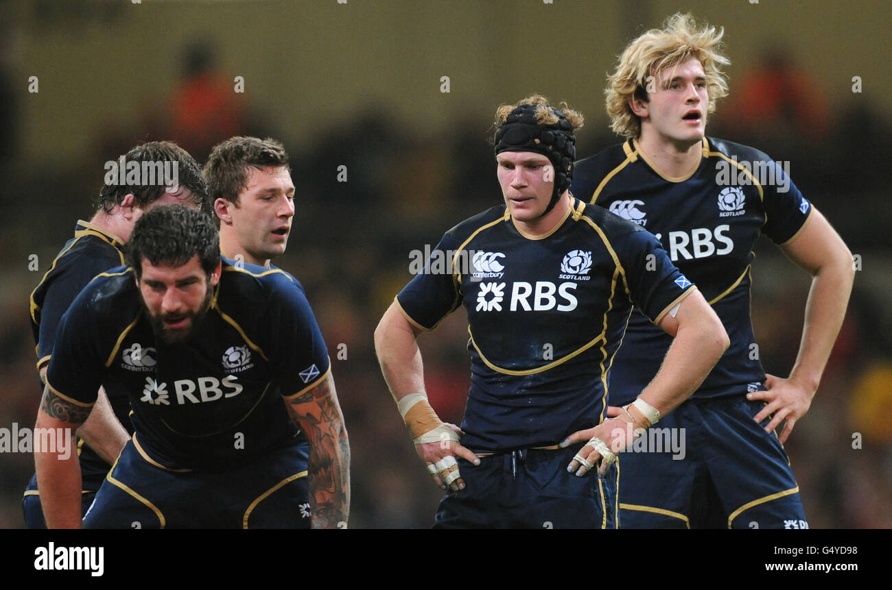 Scotland's Jim Hamilton, Ross Rennie and Richie Gray stand dejected ...