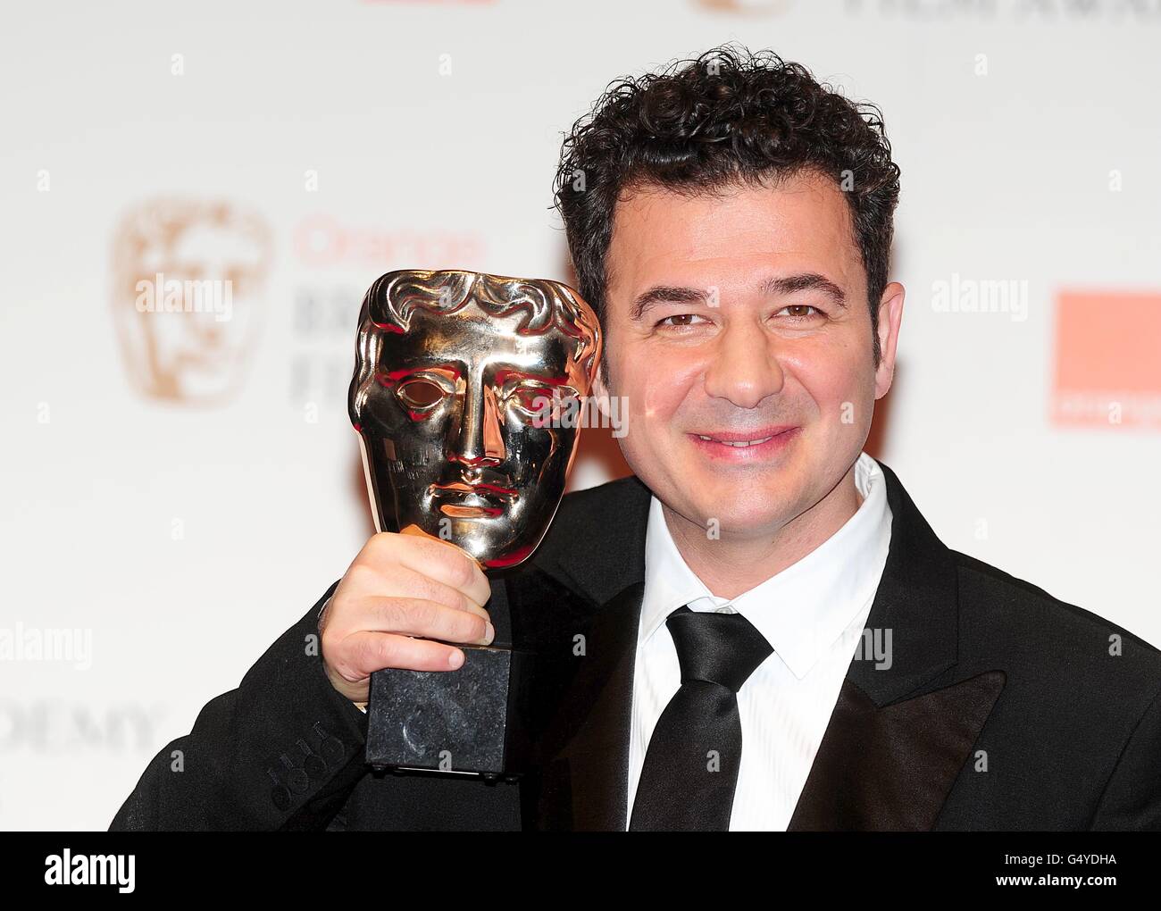 Ludovic Bource with the award for Best Original Music received for The ...