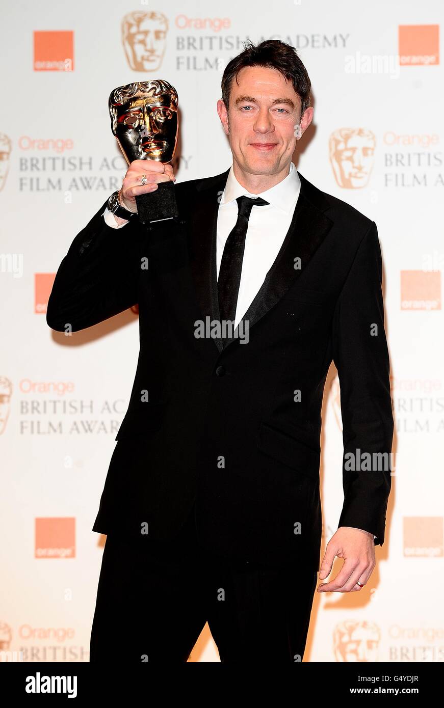 Peter Straughan with the Adapted Screenplay award for 'Tinker Tailor ...