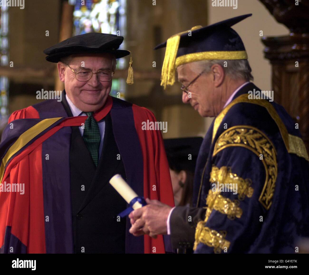 The Governor of the Bank England Eddie George (left) receiving an ...