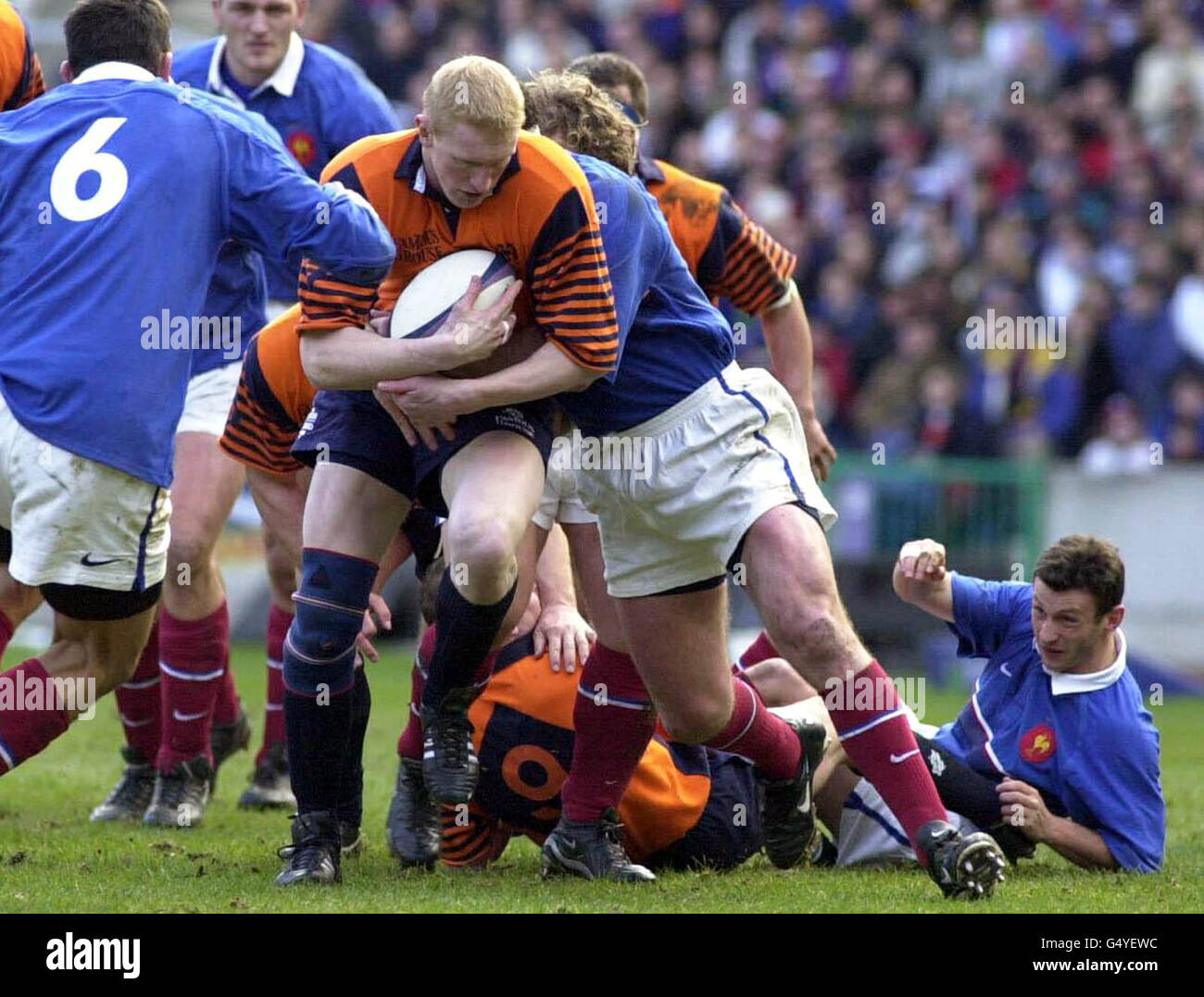 Scotland's Andy Nicol holds off the French defence during the Lloyds ...