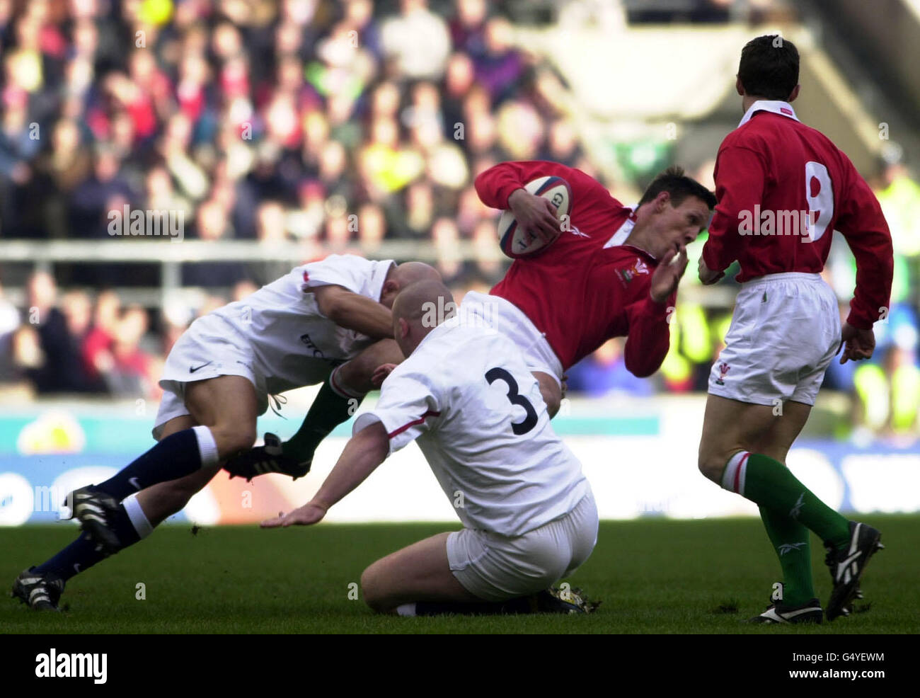 England's Phil Greening (left) and Phil Vickery bring down Wales' Shane ...