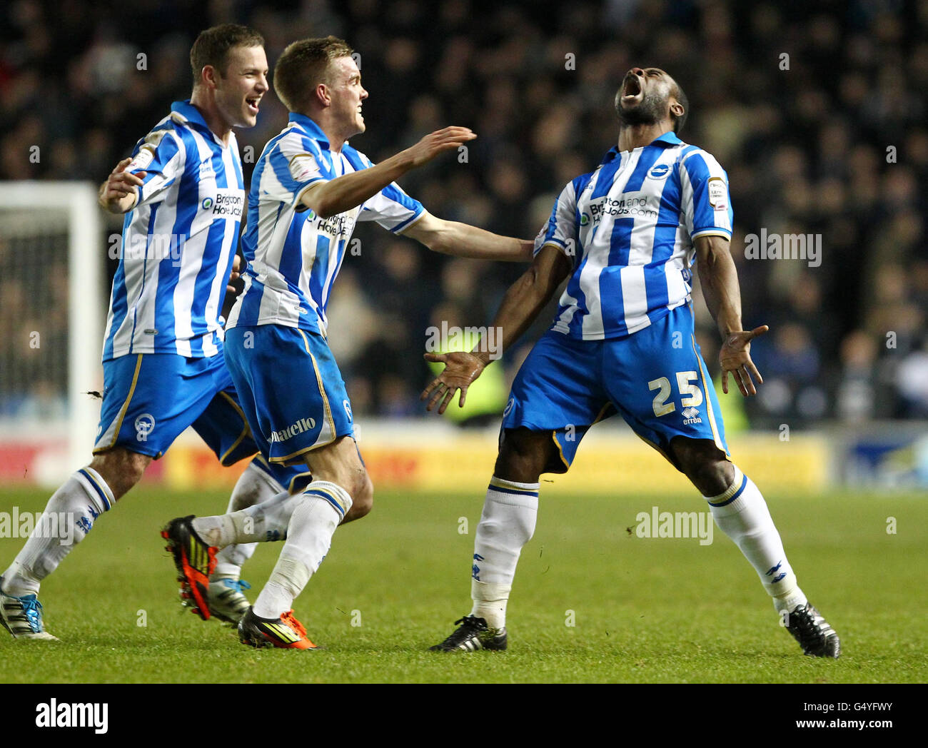 Brighton's Kazenga Lua Lua (right) celebrates scoring his sides ...