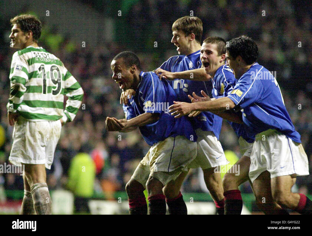 Ranger's Rod Wallace (left of group) celebrates after scoring the first ...