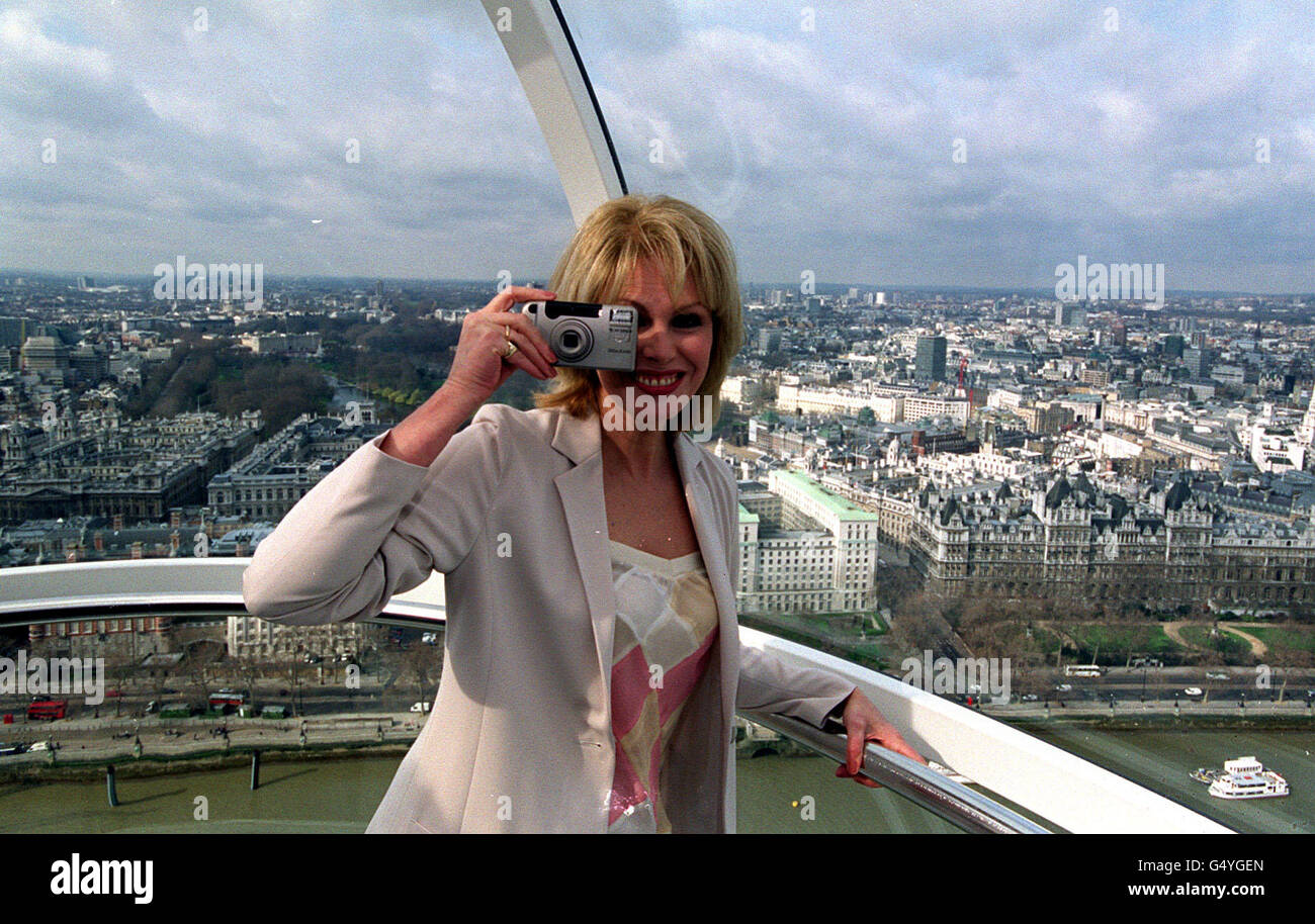 Actress lumley takes photograph whilst riding in londons newest ...