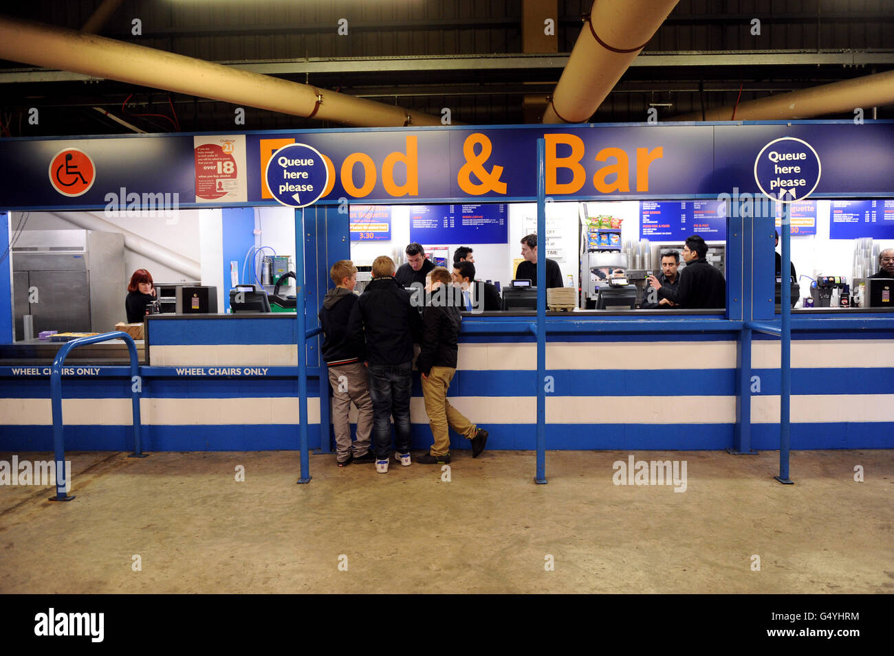 Young fans order some pre-match refreshments at the Madejski Stadium ...