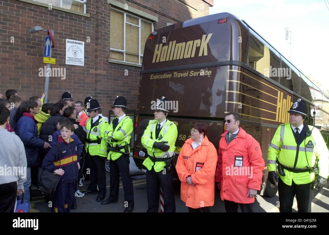 A police cordon surrounds the leeds united coach hi-res stock ...