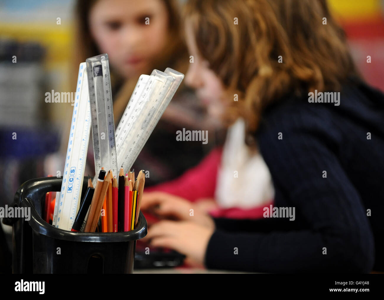 Generic stock photo shows primary school children work in classroom hi ...