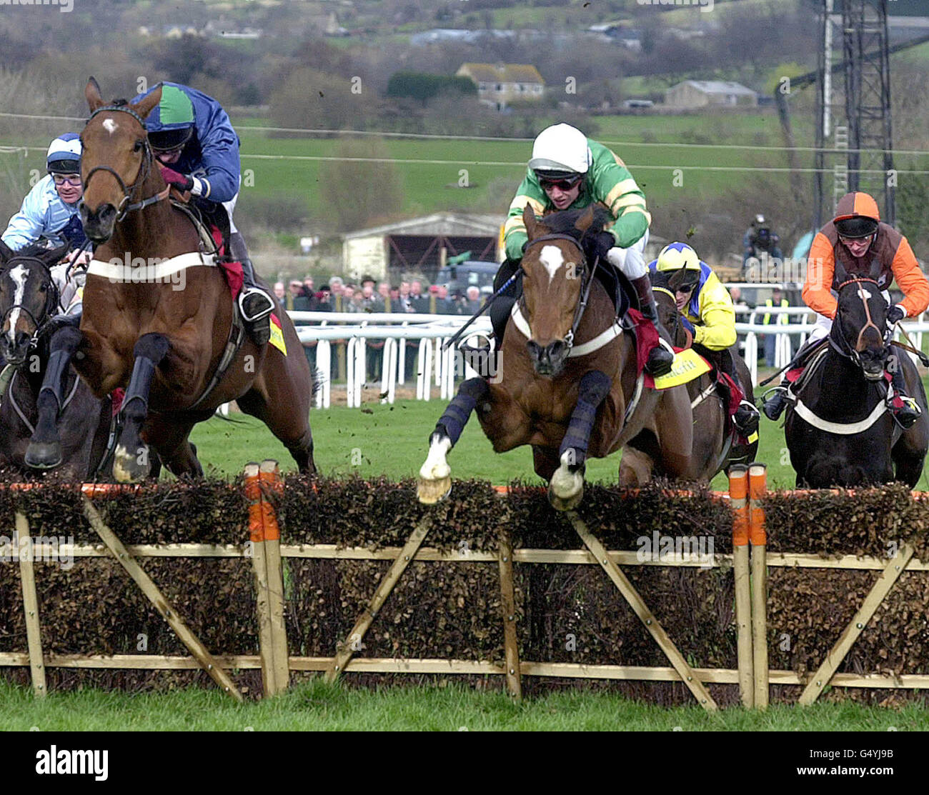 Charlie Swan and Istabraq (right, green) lead Blue Royal and Mick ...