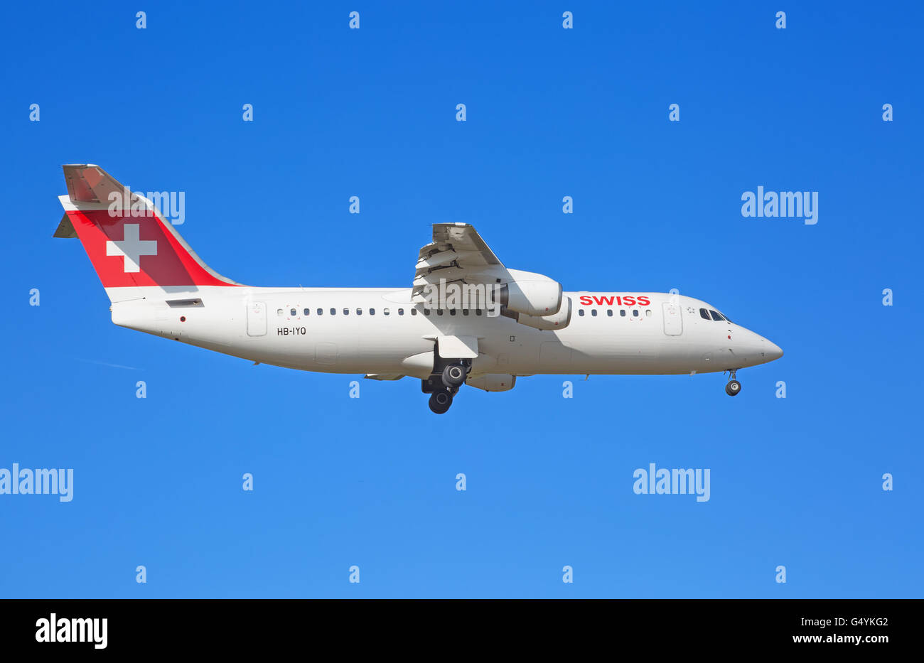 ZURICH - JULY 18: AVRO RJ100 landing in Zurich airport after short haul ...