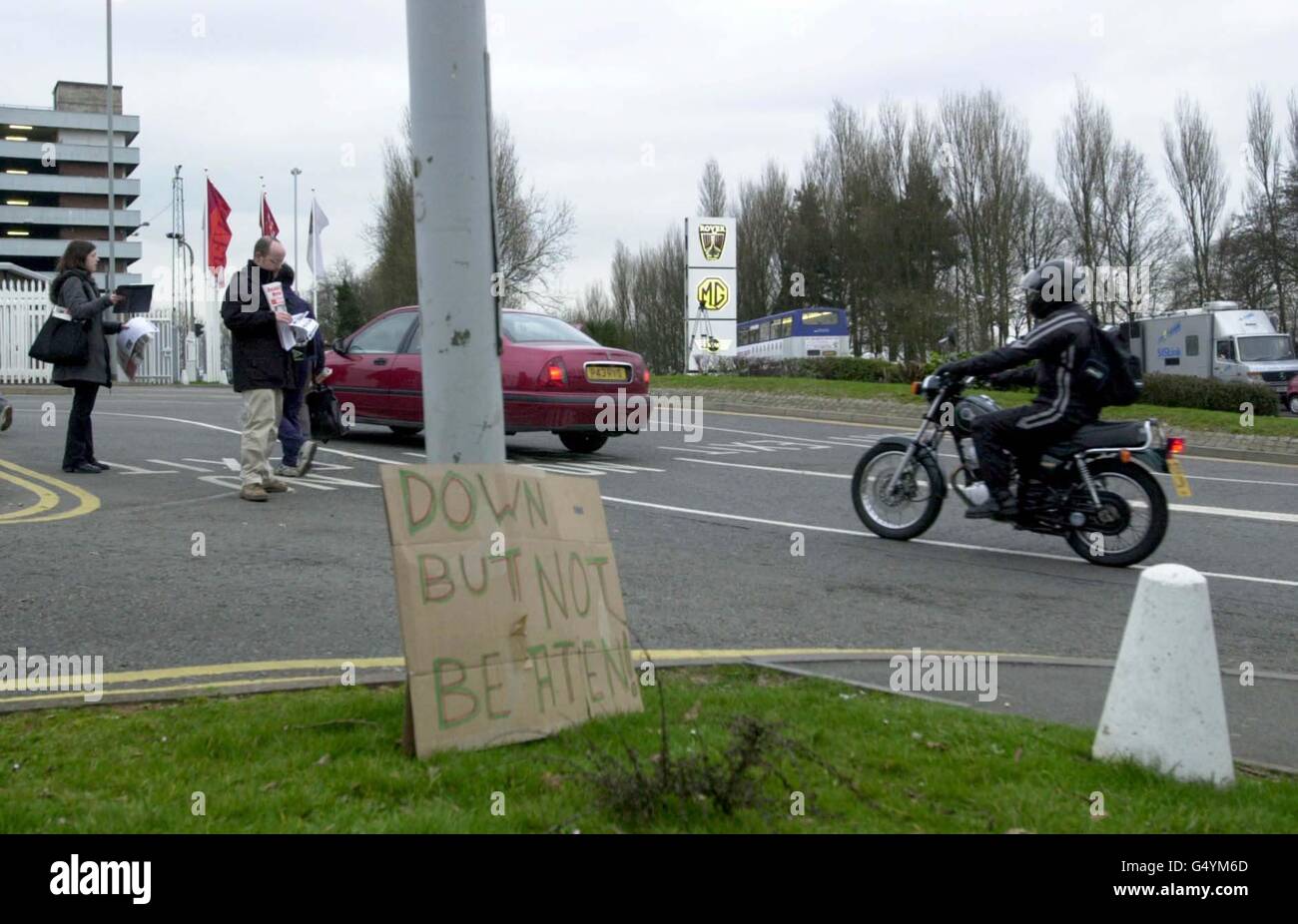 Workers arrive at the Rover plant, Longbridge for their shift. The ...